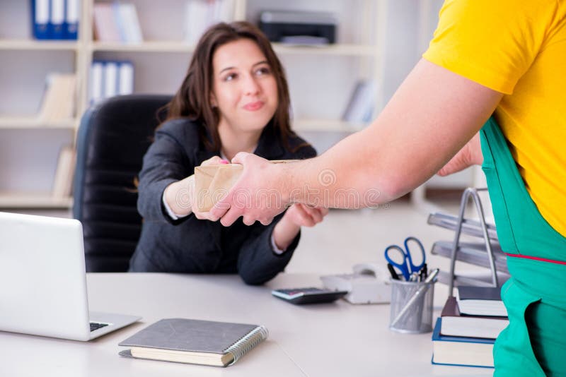 The Postman Delivering Parcel To the Office Stock Photo - Image of ...