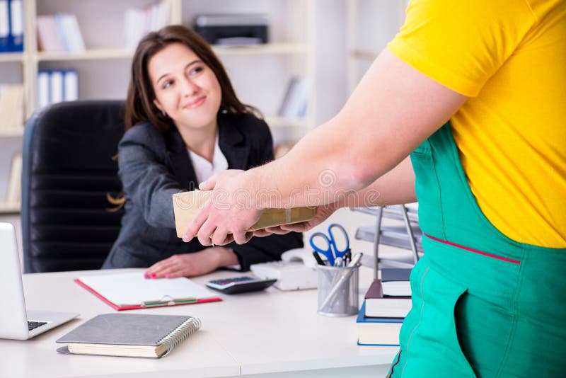 The Postman Delivering Parcel To the Office Stock Photo - Image of note ...