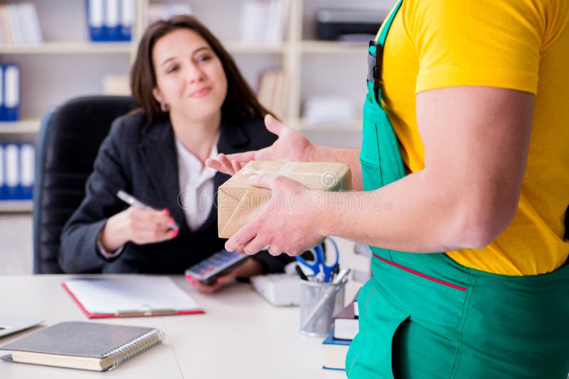 The Postman Delivering Parcel To the Office Stock Image - Image of ...