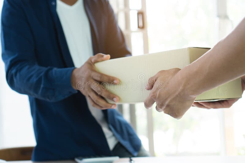 Postman Delivery a Package To Receiver Stock Photo - Image of person ...