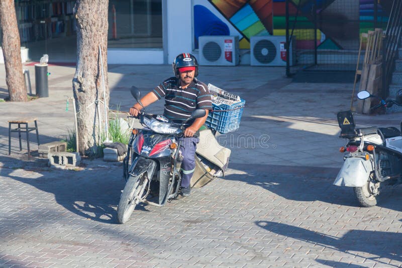Postman on Motorcycle, Postage Due Serie, Circa 1985 Editorial ...