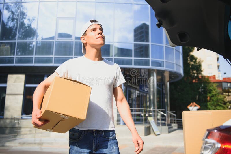 Postman with Parcel Box. Postal Delivery Service Stock Image - Image of ...