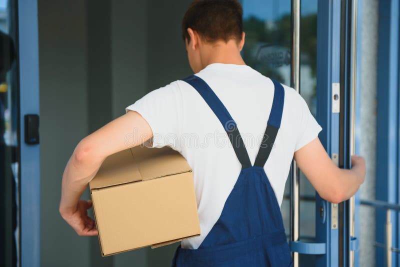 Postman with Parcel Box. Postal Delivery Service Stock Photo - Image of ...