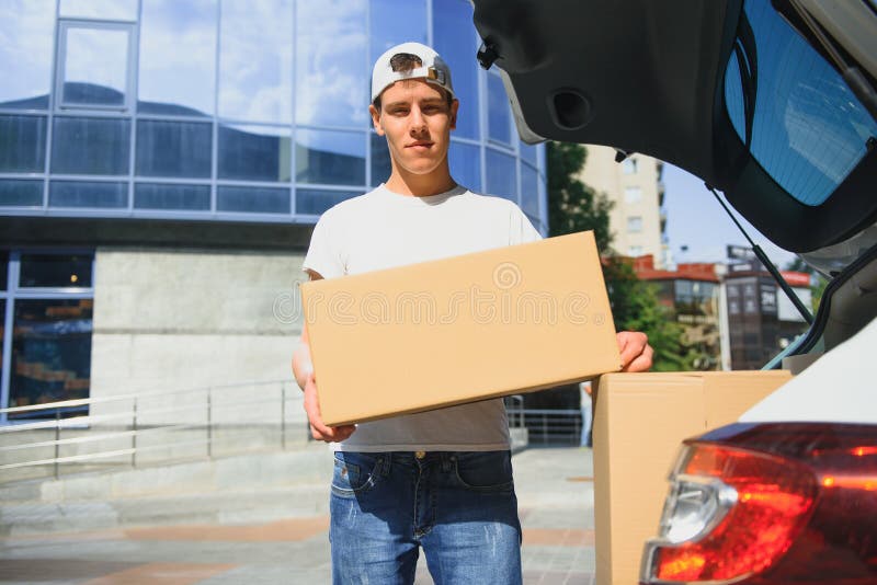 Postman with Parcel Box. Postal Delivery Service Stock Image - Image of ...