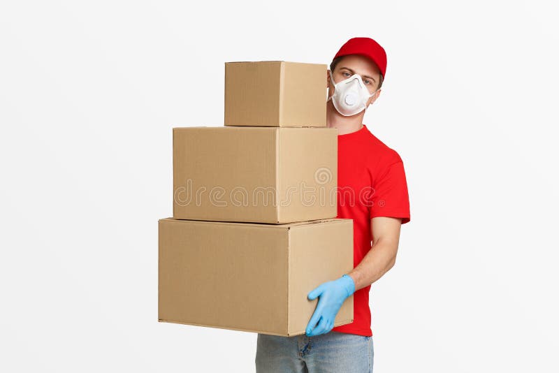 Postman in Protective Mask and Gloves Holds Many Parcels Stock Image ...