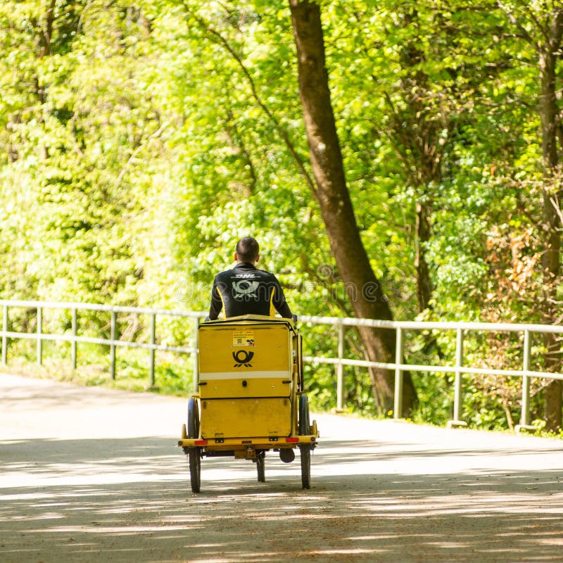 Postman Transporting Mail on a Trycicle Editorial Image - Image of ...