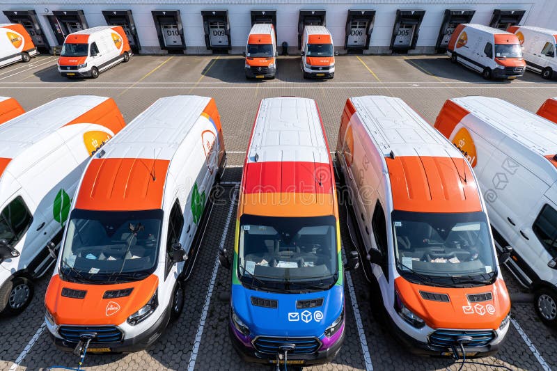 Delivery Vans are Parked in Rows. Commercial Shipping Service Company ...