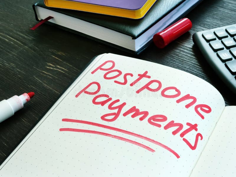 Postpone Payments Red Memo on the Page and Calculator. Deferment or ...