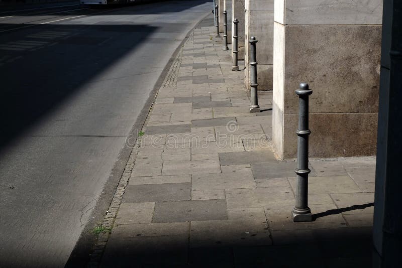 Posts Fencing Sidewalks from Cars in the Streets Stock Image - Image of ...