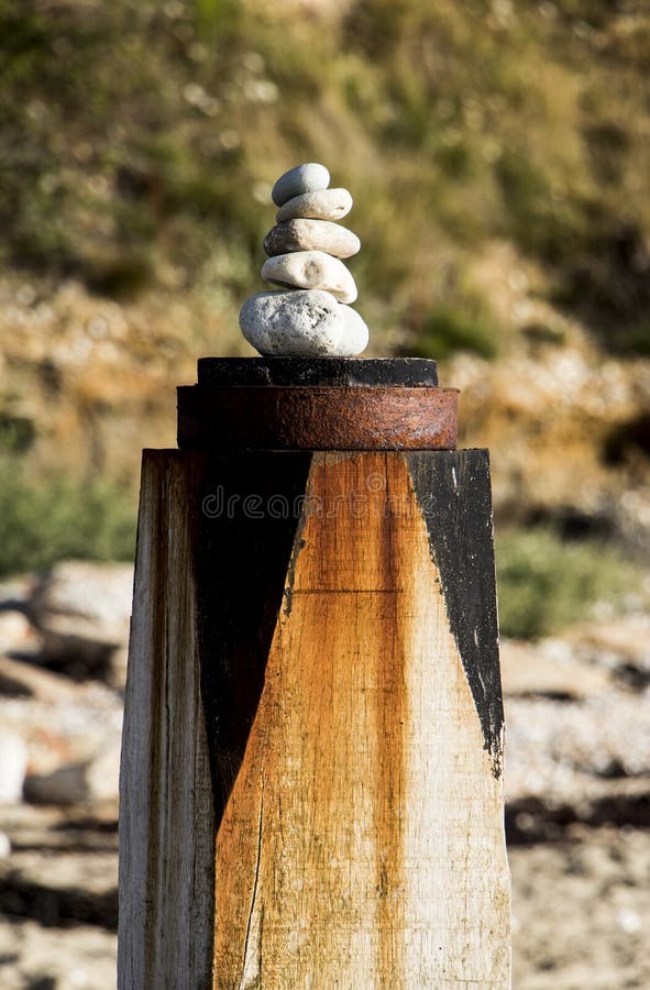 Posts with rocks stock image. Image of beach, scene - 193047263
