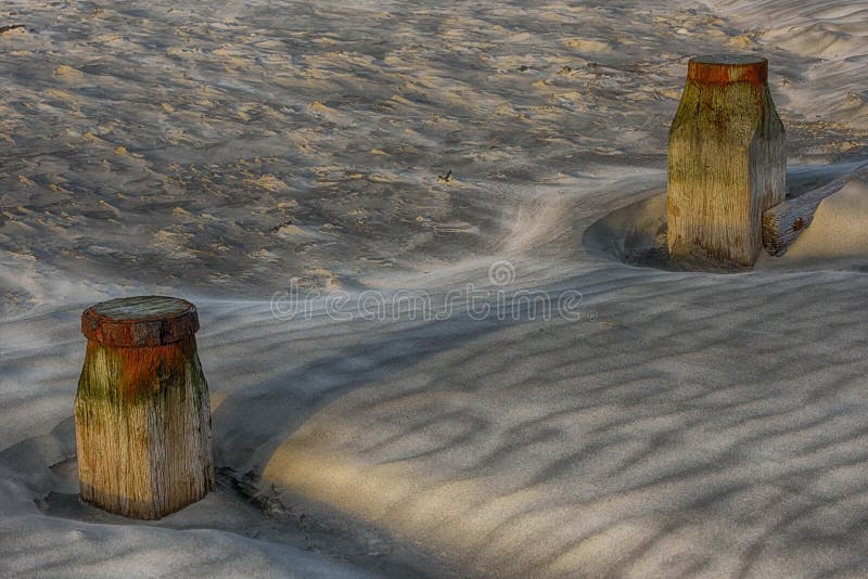 Posts in the sand stock image. Image of ring, defenses - 69172717