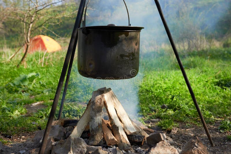 Pot boiling on the fire stock image. Image of coal, heat - 39568357