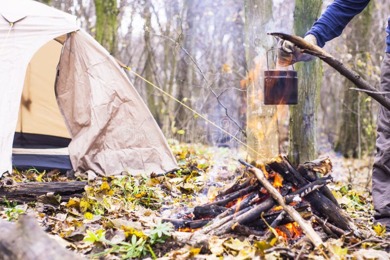 Pot of Boiling Water Heated on the Fire in the Camp Stock Image - Image ...