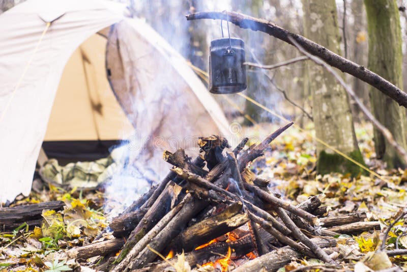 Pot of Boiling Water Heated on the Fire in the Camp Stock Image - Image ...