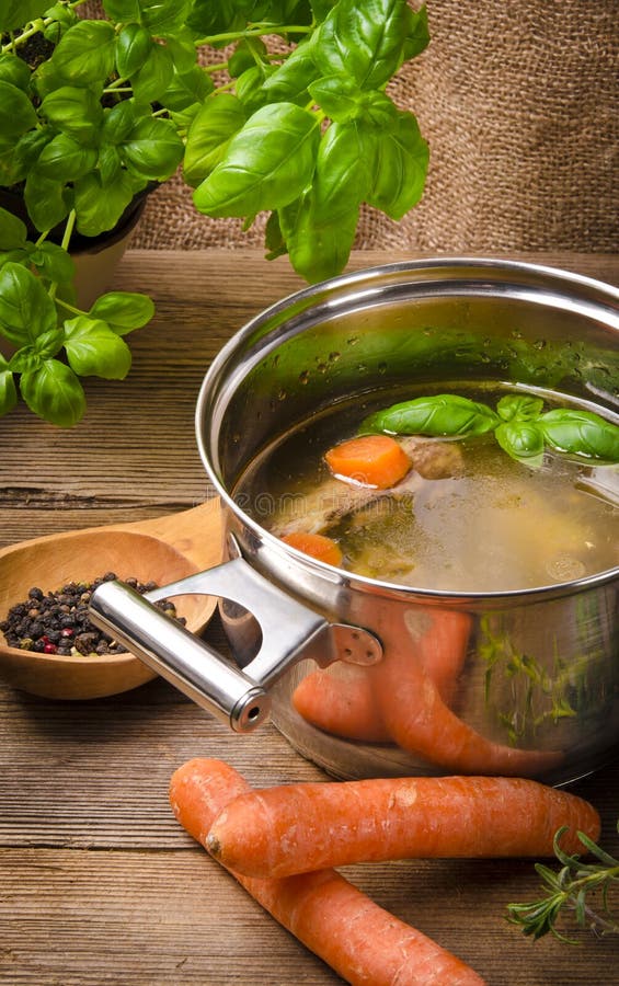 Pot with broth stock photo. Image of leaf, ingredients - 23883584