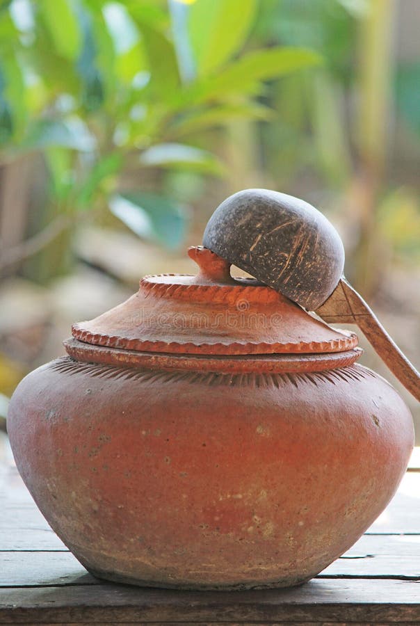 Pot and Coconut shell stock image. Image of shell, utensil - 28134951