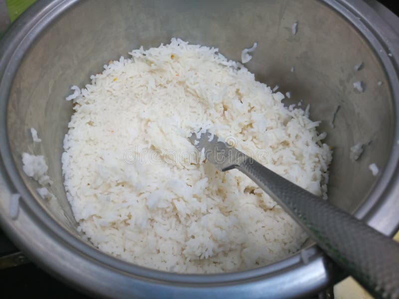Pot of Cooked Fluffy White Rice Stock Photo - Image of rice, knife ...