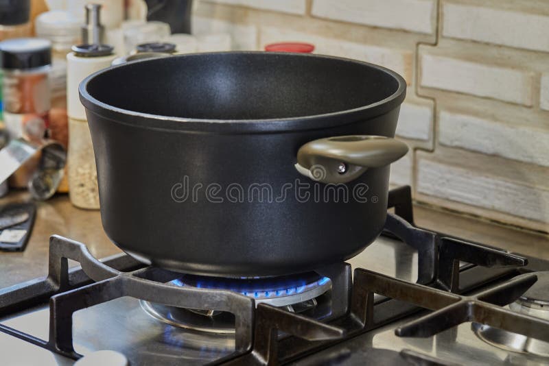 Pot with Cooking Food in the Kitchen on Gas Stove Stock Photo - Image ...