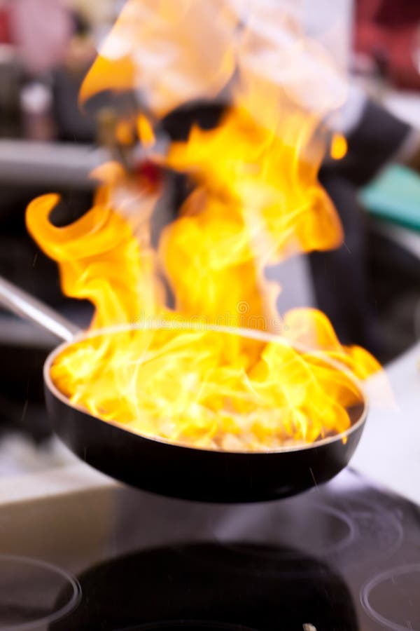 Hot Oil Fire in Kitchen stock photo. Image of awareness - 9577380
