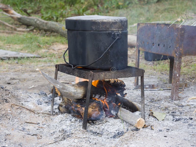 Pot in the Fire in the Summer Stock Photo - Image of fireplace, tourism ...