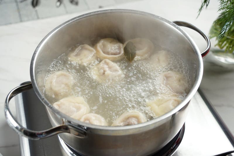 Pot Full of Dumplings in Boiling Water. Stock Photo - Image of dinner ...