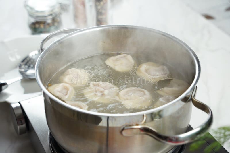 Pot Full of Dumplings in Boiling Water. Stock Image - Image of natural ...