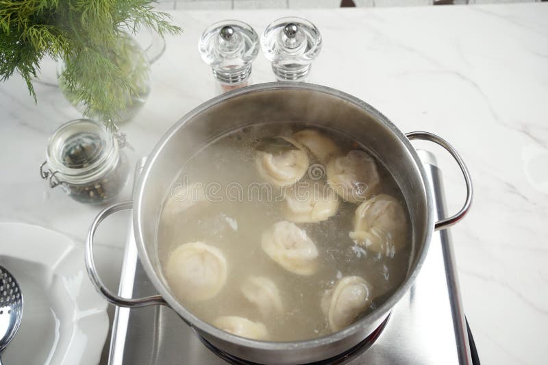 Pot Full of Dumplings in Boiling Water. Stock Image - Image of cafe ...