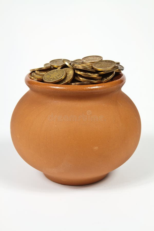 Pot full of gold coins stock photo. Image of falling - 45821814