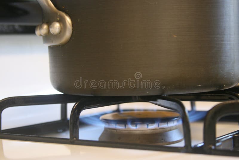 Pot on Gas Stove stock photo. Image of dishes, fire, heat - 10677242