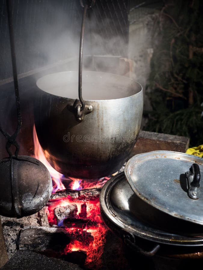 Pot Hanging from the Fireplace Above the Wood Fire Stock Image - Image ...