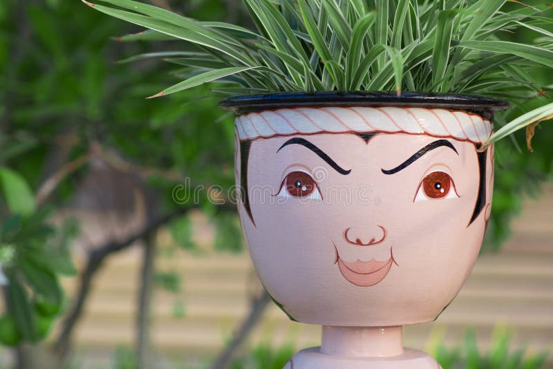 Pot, mask of Thai god stock photo. Image of creature - 61578480