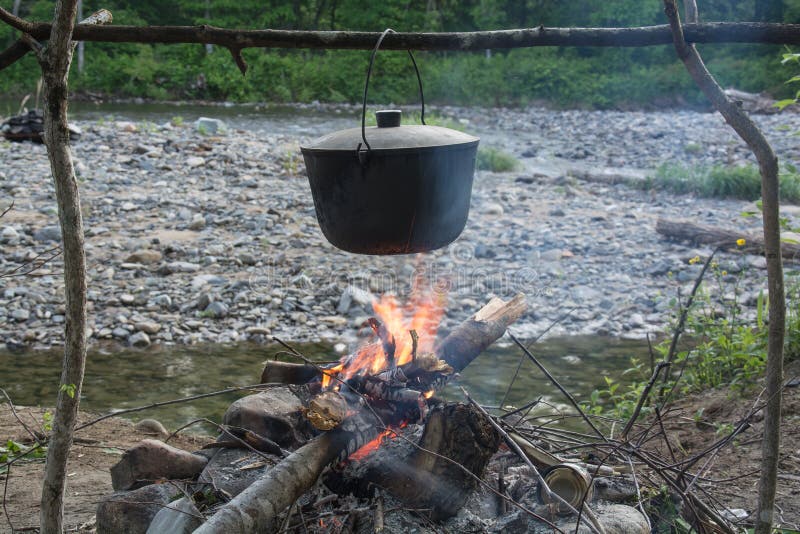 Saucepan over a bonfire stock photo. Image of nature - 33795082