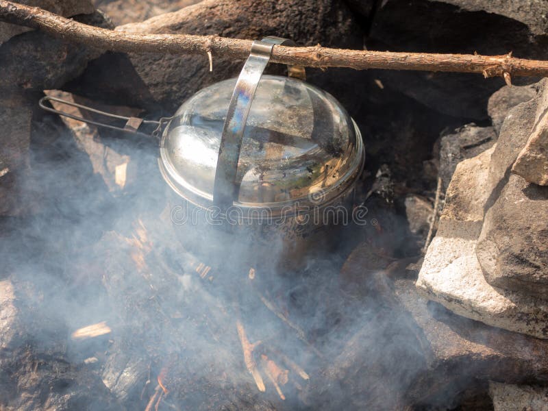 Pot in a stone hearth stock image. Image of outdoor - 256527213