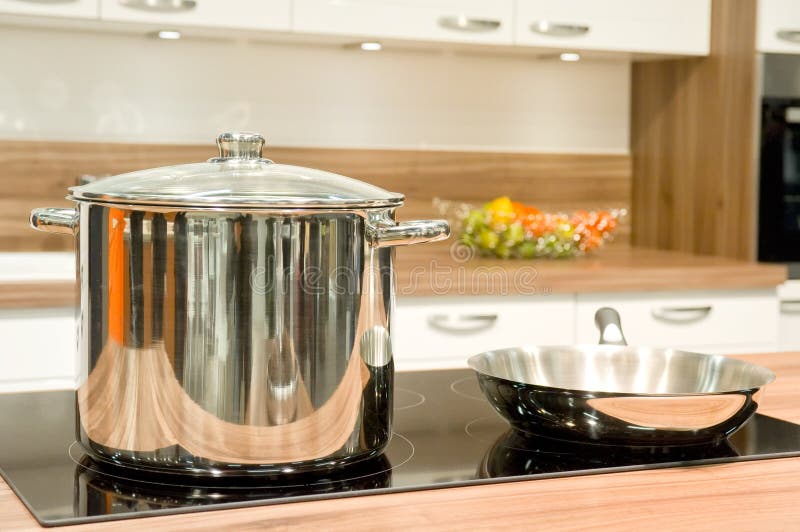 Pot and pan in the kitchen stock photo. Image of board - 31249074