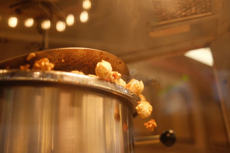 A Pot of Popcorn is Being Cooked in a Machine Stock Image - Image of ...