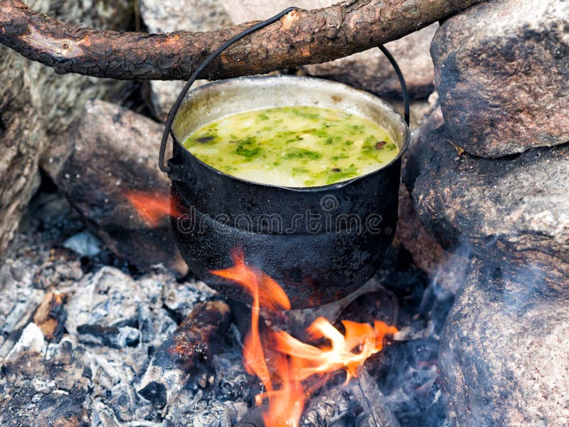 A Pot of Soup on a Bonfire among the Stones Stock Image - Image of ...
