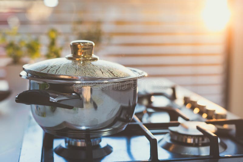 Pot on the Stove in the Evening Stock Photo - Image of cook, bubble ...