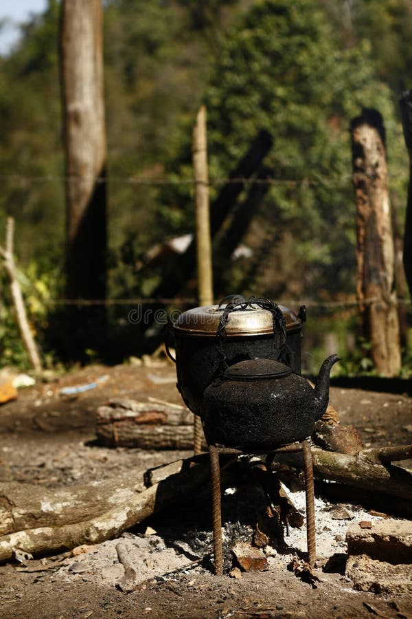Pot of tea on the fire stock photo. Image of adventure - 109828384