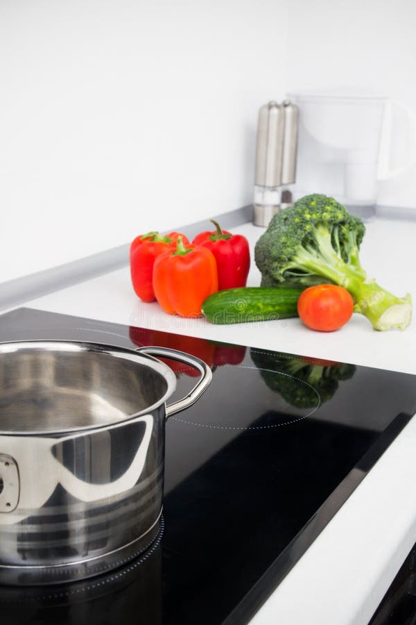 Pot and Vegetables in Modern Kitchen Stock Image - Image of food, cook ...