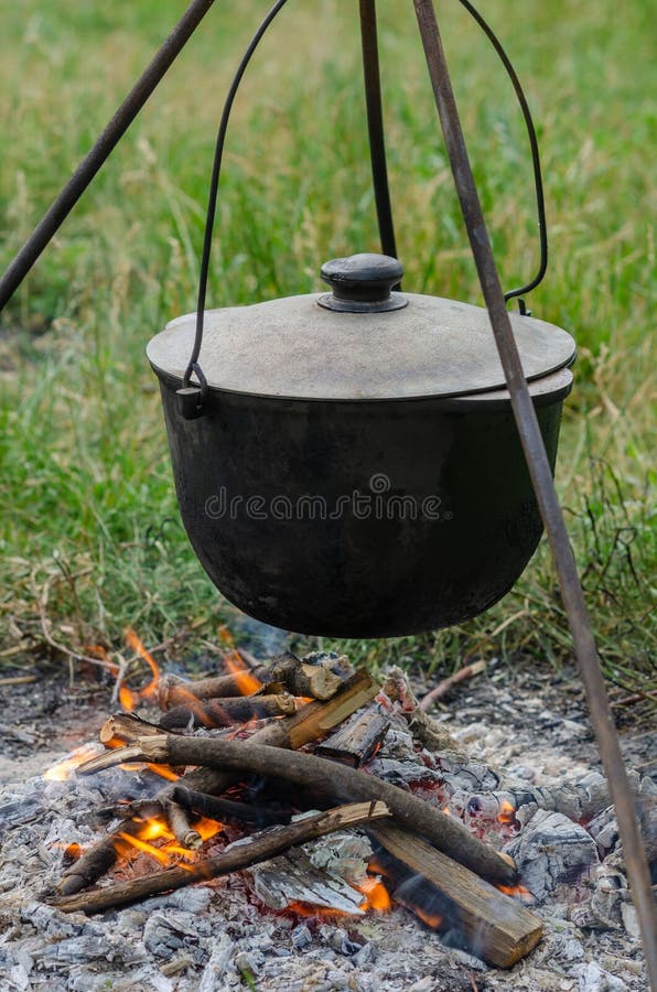 A Pot in Which Soup is Cooked on a Tripod Stands on a Fire Stock Image ...