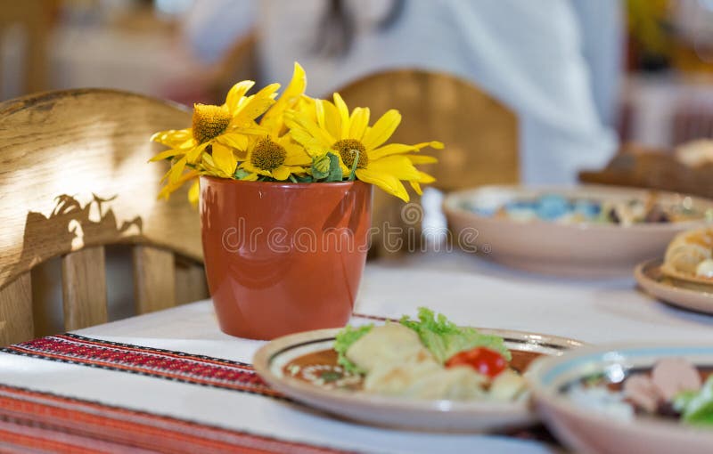 A Pot of Yellow Daisies on a Dinner Table Stock Image - Image of flora ...
