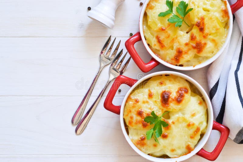 Potato Casserole with Bechemel Sauce and Cheese on the Kitchen Table ...