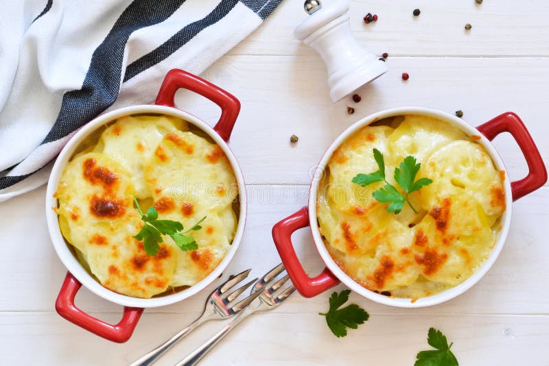 Potato Casserole with Bechemel Sauce and Cheese on the Kitchen Table ...