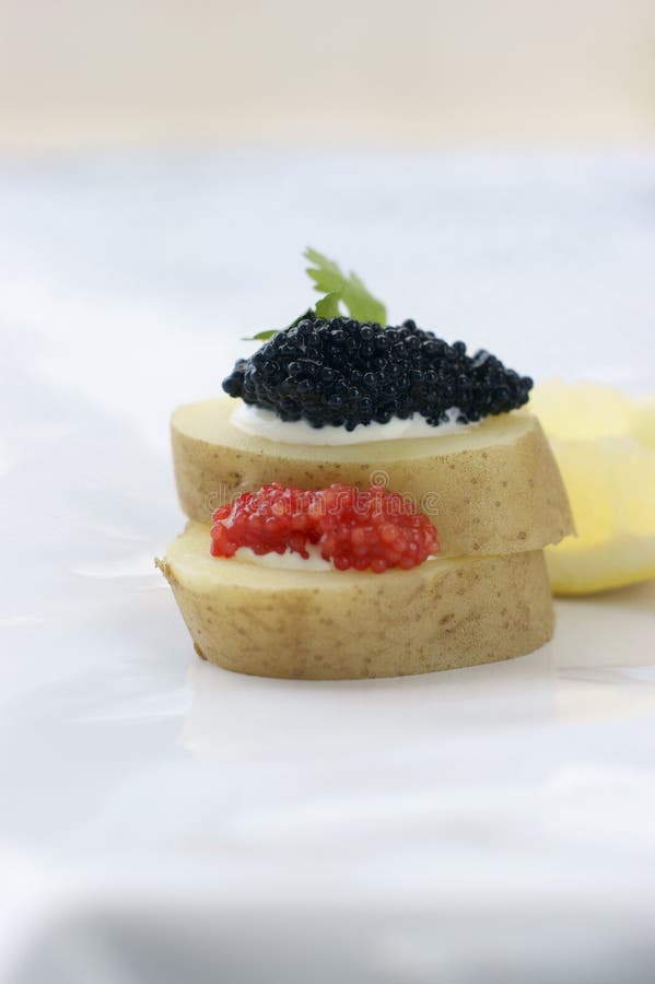 Potato and caviar canap s stock image. Image of cream - 23709879