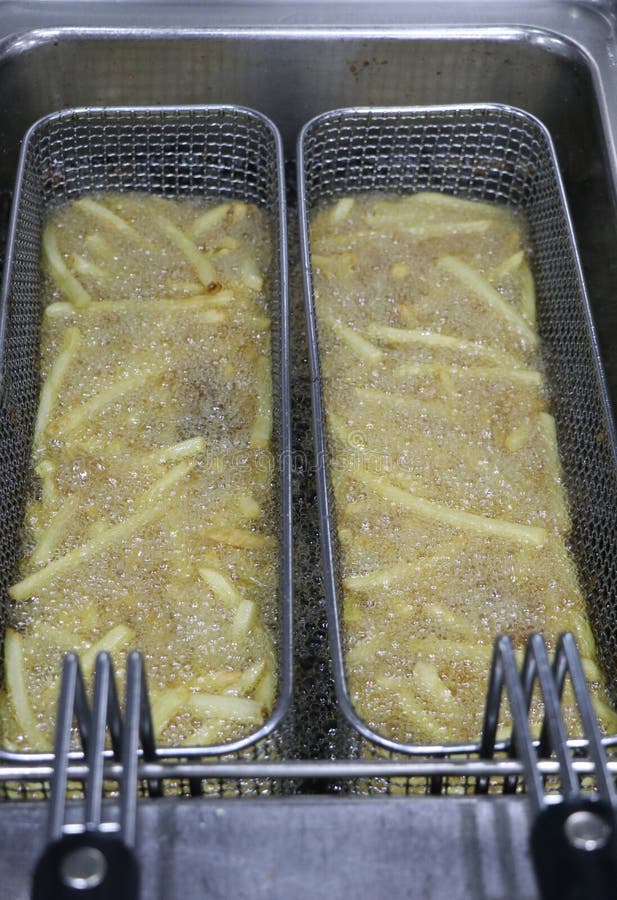Potato Chips Frying in a Deep Fryer Stock Image - Image of lunch ...