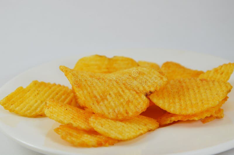 Potato chip on dish stock photo. Image of dish, crispy - 57903910