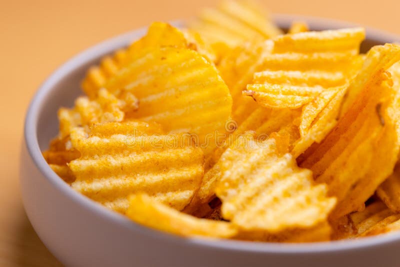 Potato chips crisps stock image. Image of yellow, pile - 279920737