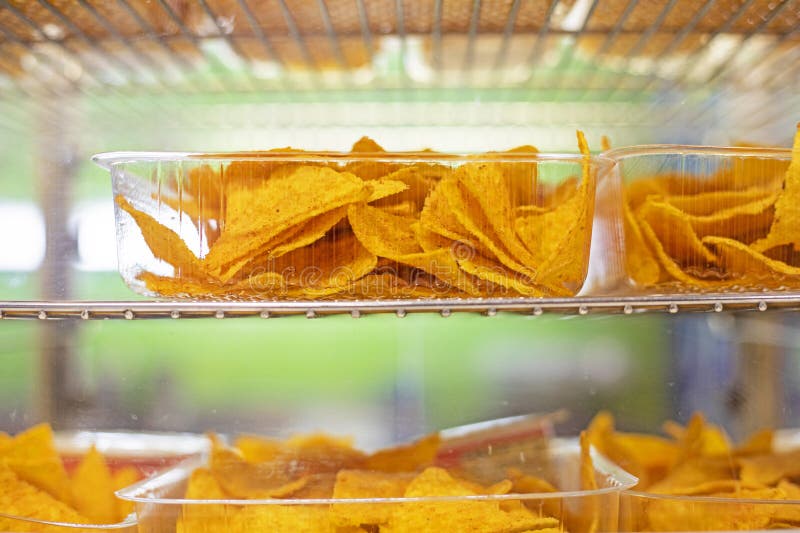 Potato Chips with Different Flavors in Plastic Containers. Stock Image ...