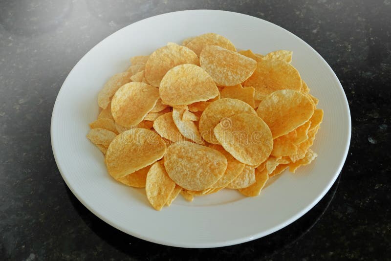 Potato chips in the dish stock photo. Image of eating - 45573784