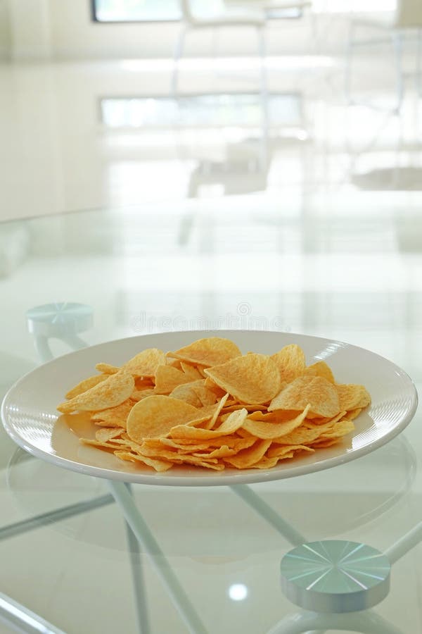 Potato chips in the dish stock image. Image of crispy - 45760059